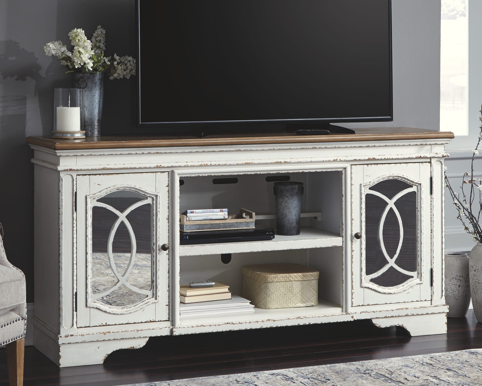 Realyn Chipped White Xl TV Stand W Fireplace Option Furniture Warehouse Ohio